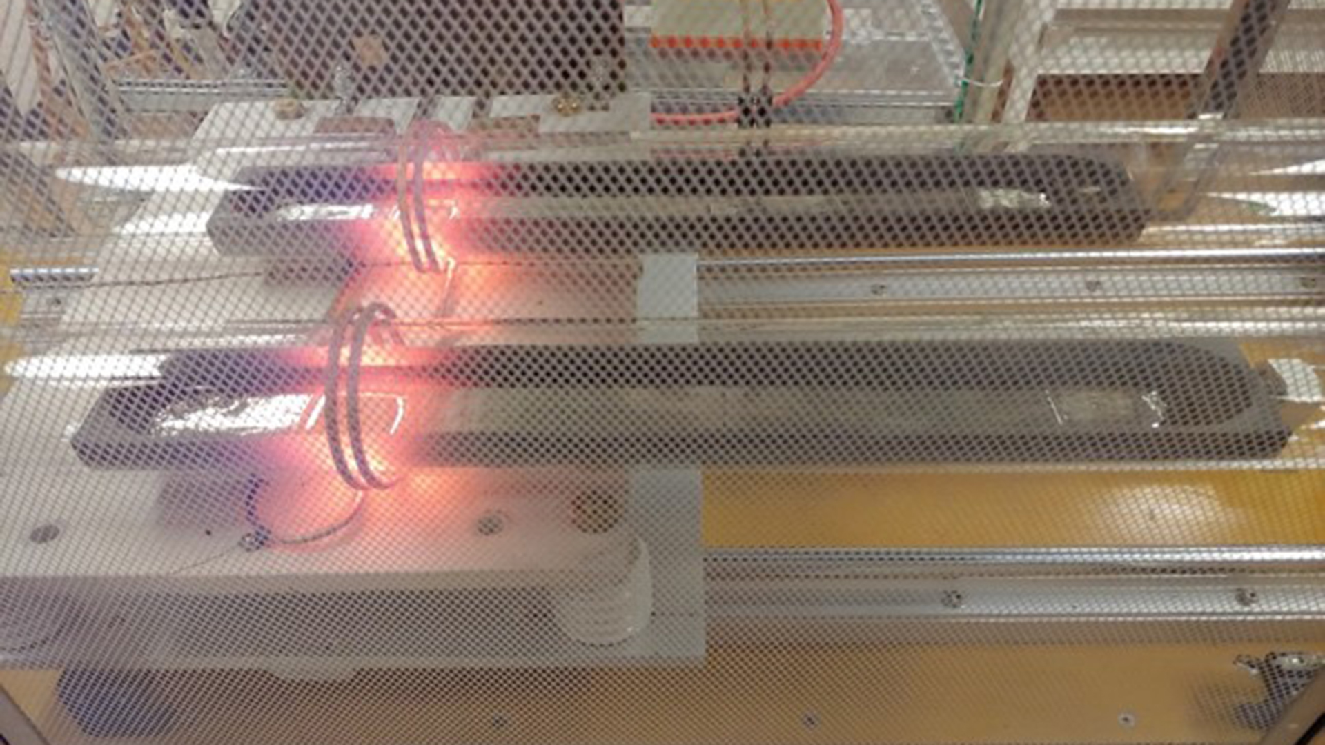 How crystal growth experiments will aid the search for ghost particles